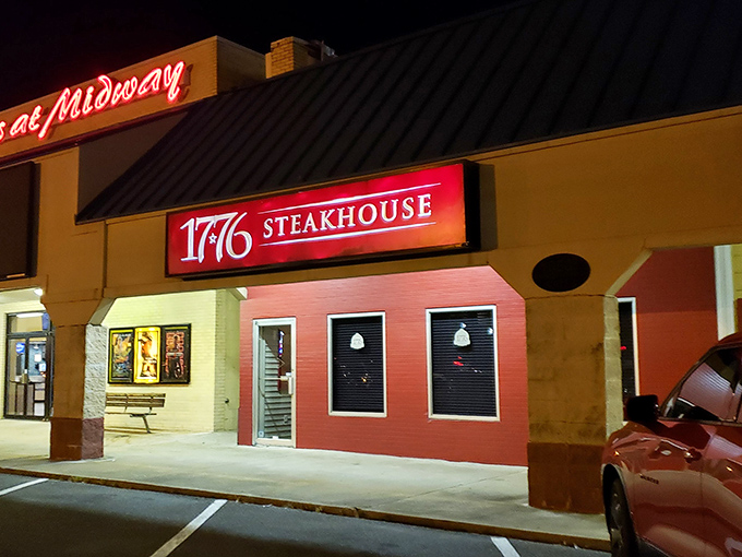 The iconic red fa&ccedil;ade and teal roof of 1776 Steakhouse stands as a beacon for carnivores seeking revolution-worthy meals in Rehoboth Beach.