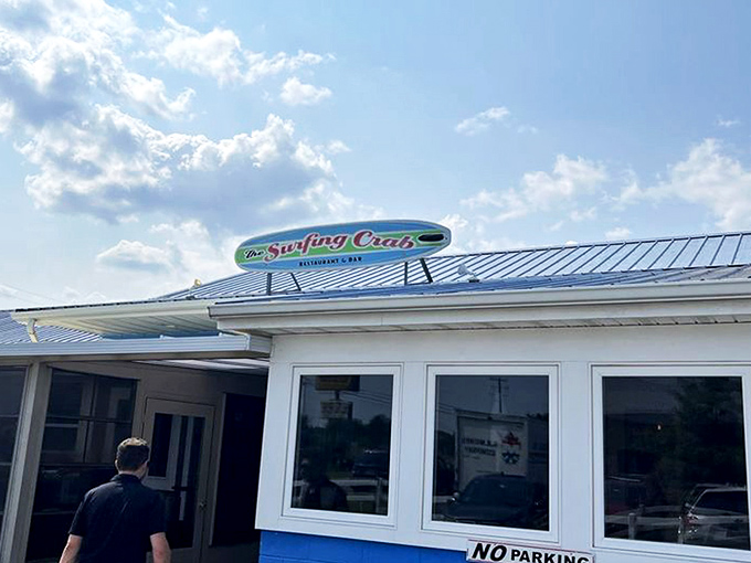 The blue-sided sanctuary of seafood salvation sits unassumingly along the highway, promising treasures from the deep for those wise enough to stop.