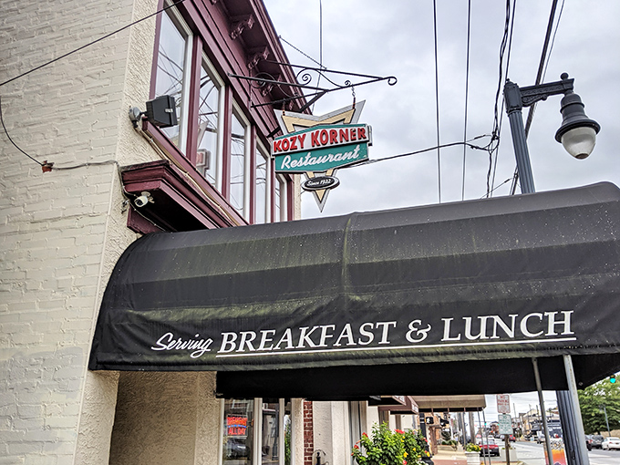 The unassuming black awning of Kozy Korner beckons like a secret handshake among breakfast aficionados. No flash, all substance.