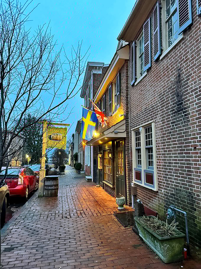 The historic fa&ccedil;ade of Jessop's Tavern welcomes you with colonial charm, international flags, and that wooden barrel that practically whispers, "Good times await inside."