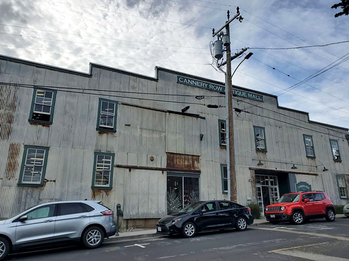 The rusted corrugated exterior isn't just authentic industrial chic&mdash;it's a time portal disguised as a building. Step through those white doors and prepare for temporal whiplash.