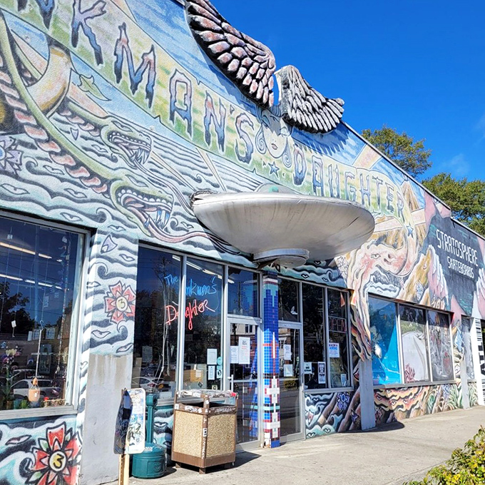The psychedelic facade of Junkman's Daughter looks like what would happen if Salvador Dal&iacute; designed a retail store. Wings, hands, and cosmic imagery announce: normal stuff definitely not sold here.