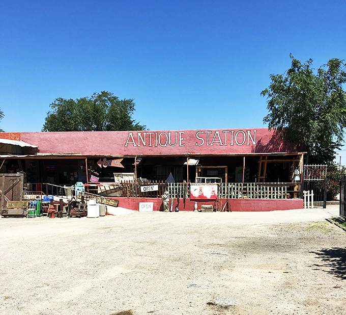 The desert sky creates a perfect backdrop for Antique Station's vibrant red fa&ccedil;ade. Route 66 charm doesn't get more authentic than this roadside treasure trove.