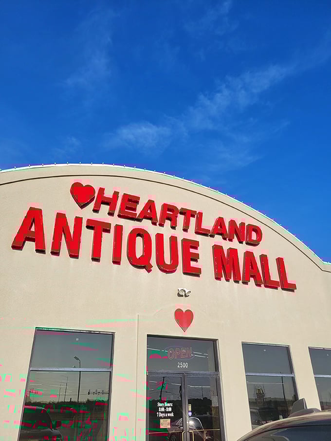 The bright red signage against a clear blue Missouri sky promises treasures within &ndash; your first clue that normal shopping rules don't apply here.