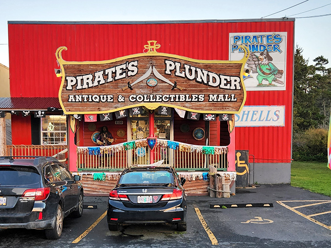 The ship has come ashore! Pirate's Plunder's wooden ship-shaped entrance promises treasures within, complete with colorful flags and nautical charm.