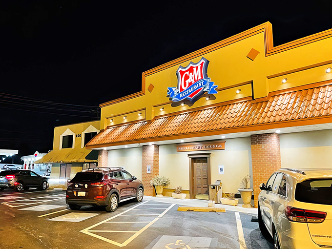 The golden glow of G & M's exterior at night isn't just lighting&mdash;it's a beacon calling all crab cake pilgrims home to their sanctuary.