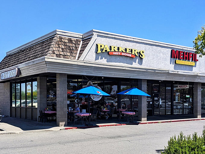 The unassuming storefront that houses hot dog greatness. Parker's yellow sign beckons like a beacon of hope in a sea of chain restaurants.