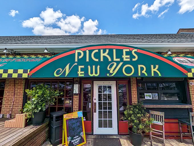 The emerald-green storefront of Pickles NY beckons like a deli oasis in the Florida suburbs. That iconic checkerboard trim promises authentic New York flavors await inside.