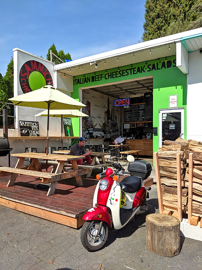The vibrant red exterior of Sammich PDX beckons like a siren call to sandwich lovers. Outdoor seating perfect for Portland's precious sunny days.