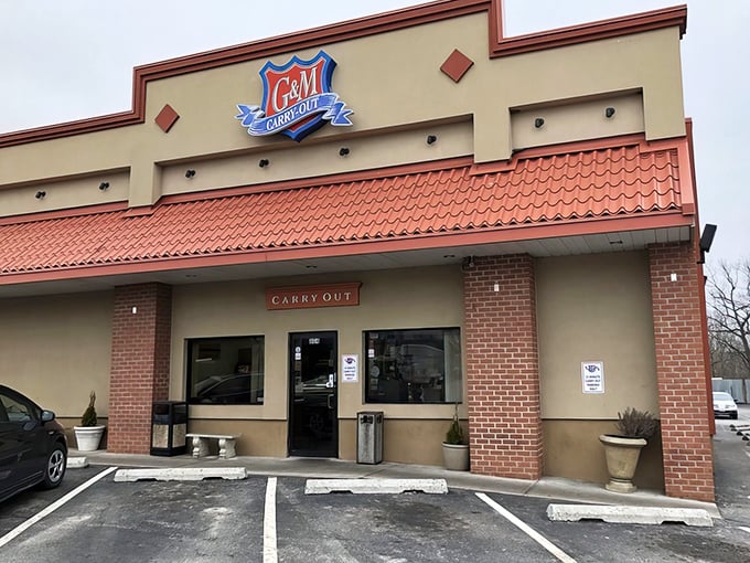 The golden glow of G & M's exterior at night isn't just lighting—it's a beacon calling all crab cake pilgrims home to their sanctuary.