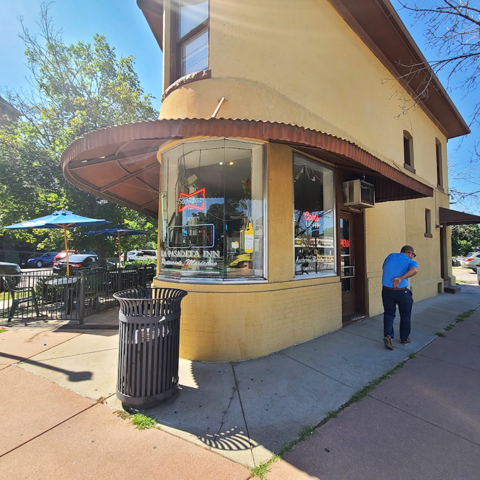 That iconic yellow building with its distinctive pyramid roof isn't just architectural whimsy&mdash;it's a beacon of authentic Mexican flavors hiding in plain sight.