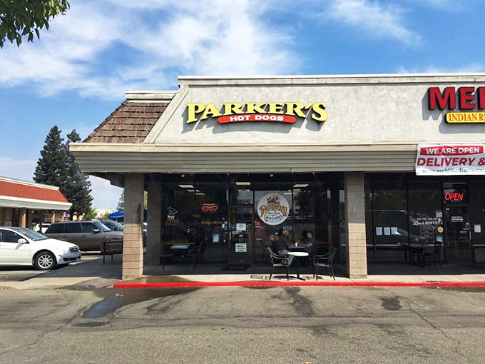The unassuming storefront that houses hot dog greatness. Parker's yellow sign beckons like a beacon of hope in a sea of chain restaurants.
