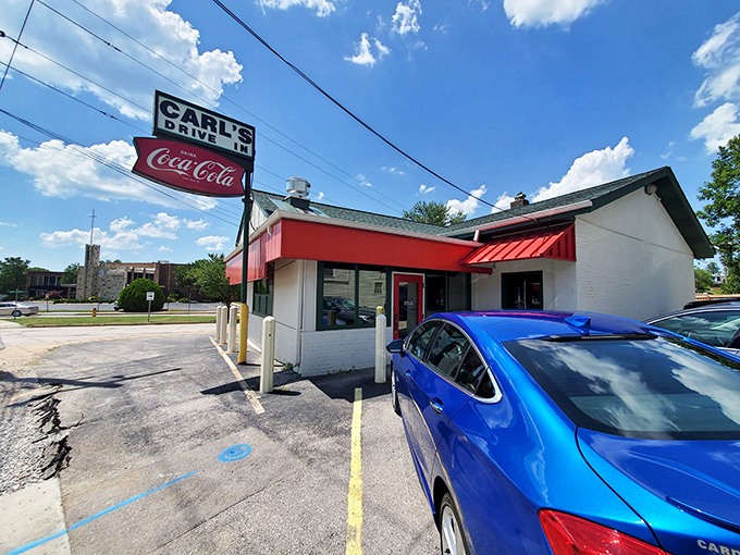 Classic Americana never goes out of style at Carl's Drive-In, where the iconic red awning has beckoned hungry travelers since 1959.
