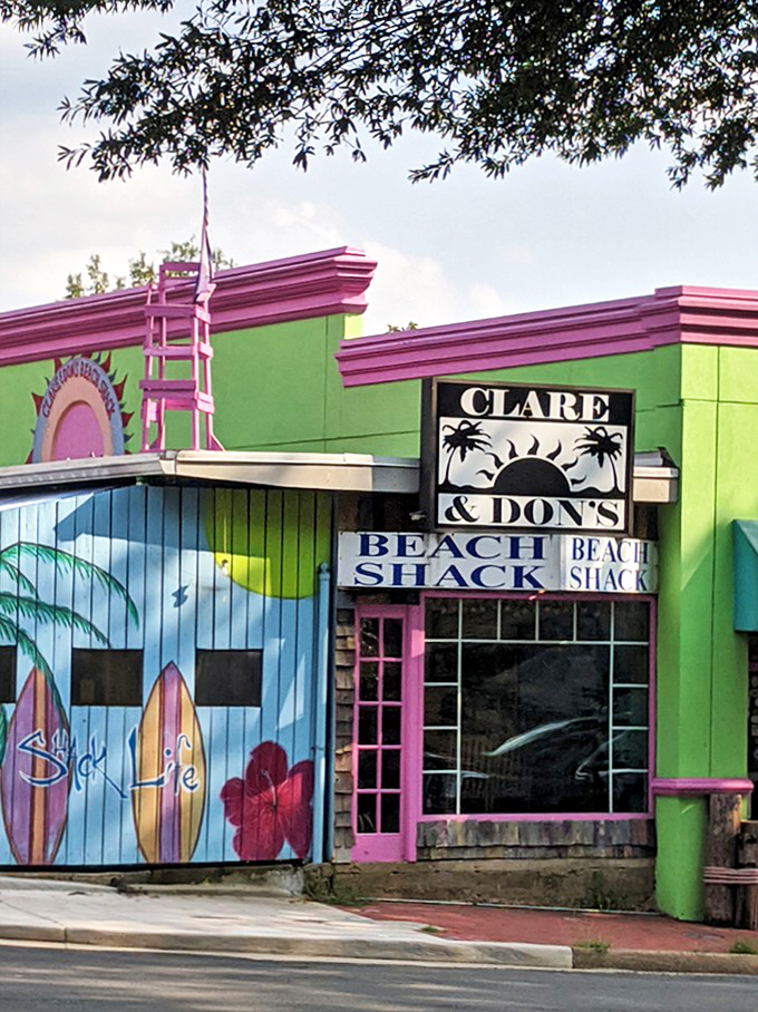 The lime green and hot pink exterior of Clare & Don's Beach Shack stands out like a tropical bird in Falls Church. Florida vacation vibes crash-landed on Virginia soil!
