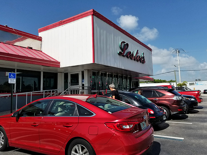 Lester's iconic red and white exterior stands like a beacon of breakfast hope on State Road 84, promising comfort food salvation since 1967.