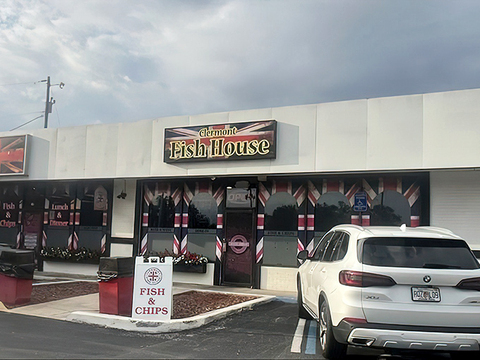 The Tudor-style exterior of Clermont Fish House stands as a slice of Britain in Florida, complete with an iconic red phone booth.