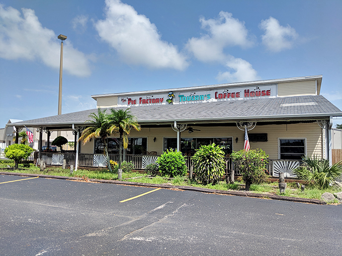 The Pie Factory's charming Old Florida exterior promises sweet treasures within. Palm trees and a welcoming porch set the perfect stage for pie-based euphoria.