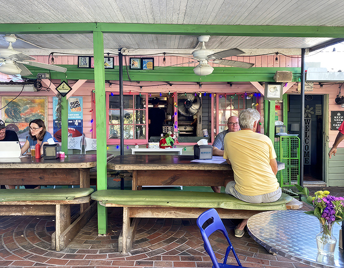 The pink facade of The Chattaway stands like a cheerful time capsule on 4th Street South, its vintage sign proudly announcing "Established 1921" to passing motorists.