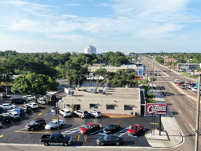 The iconic red Kissin' Cuzzins sign stands sentinel on 34th Street, a beacon of breakfast hope that's been guiding hungry St. Petersburg locals for decades.
