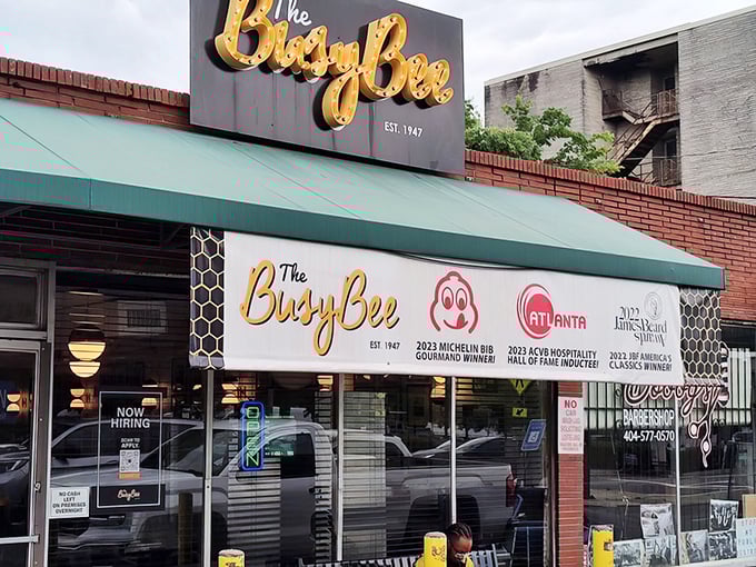 The iconic blue and yellow sign beckons hungry pilgrims like a Southern food lighthouse. The James Beard award banner confirms what locals already knew: this place is legendary.