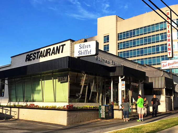 The unassuming storefront of The Silver Skillet stands like a time capsule on Atlanta's 14th Street, promising authentic Southern comfort without an ounce of pretension.