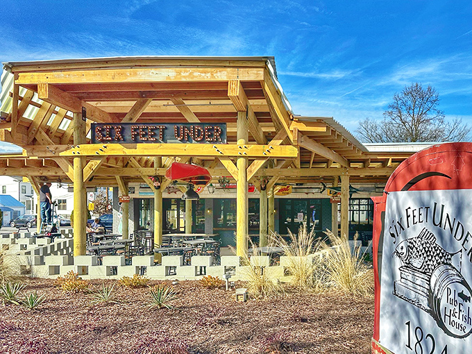 The unassuming gray exterior of Six Feet Under belies the seafood paradise waiting inside. That fish logo promises delicious things to come.