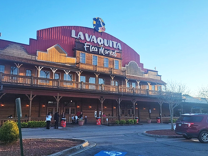 The unmistakable red barn facade of La Vaquita welcomes treasure hunters with autumn's fiery maples standing guard like colorful sentinels of bargain paradise.