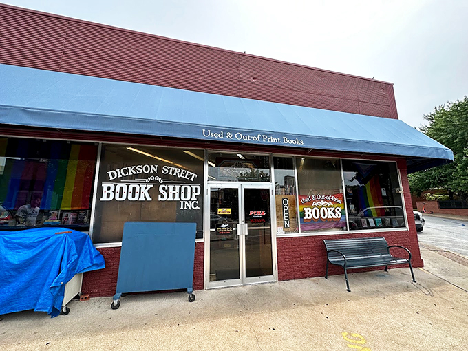 The brick-red exterior with its cheerful blue awning beckons bibliophiles like a literary lighthouse on Fayetteville's Dickson Street. This isn't just a store&mdash;it's a destination.