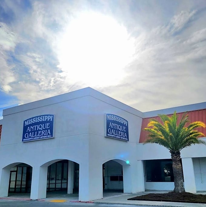 The classic car parked outside isn't just decoration&mdash;it's a time machine preview of the wonders waiting inside Mississippi Antique Galleria.