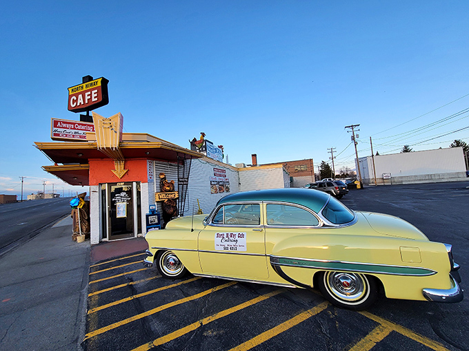 The iconic North Hi-Way Cafe sign stands tall against the Idaho sky, a beacon of breakfast hope for hungry travelers and locals alike.