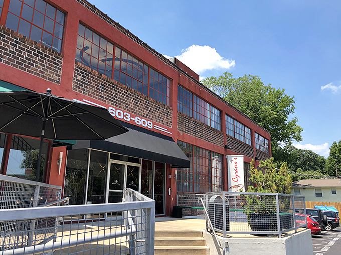 The unassuming red brick exterior of Cyrano's Cafe stands like Clark Kent before transformation &ndash; no cape needed, just carrot cake within. 