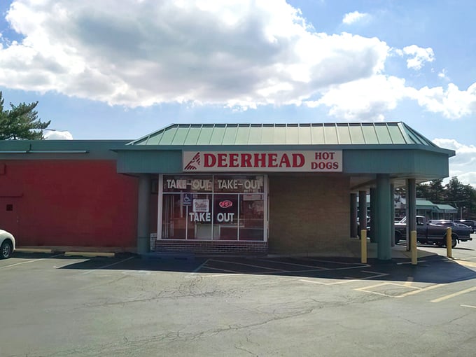 The iconic Deerhead sign beckons hungry travelers like a lighthouse guiding ships to the promised land of perfect hot dogs.