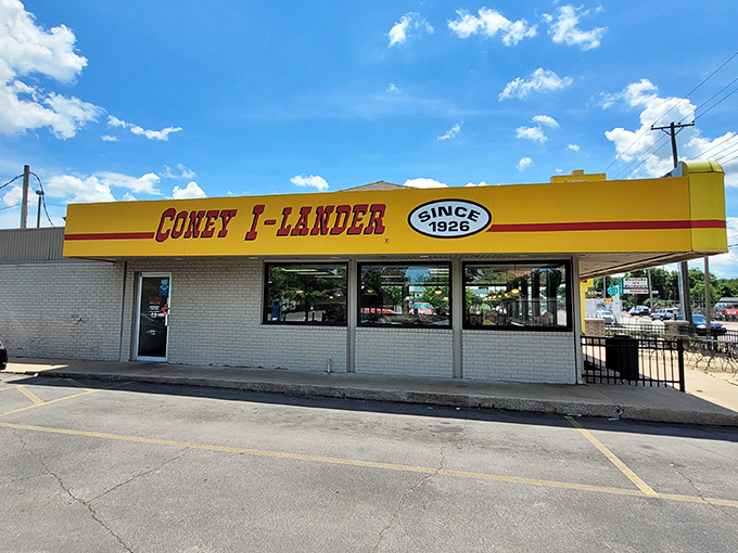 That bright yellow facade isn't just eye-catching—it's a beacon of hope for the chili dog deprived. Since 1926, this modest building has been Tulsa's answer to fast food royalty.