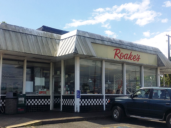 The unassuming exterior of Roake's stands like a time capsule on Columbia Boulevard, promising simple pleasures that fancy restaurants often forget.
