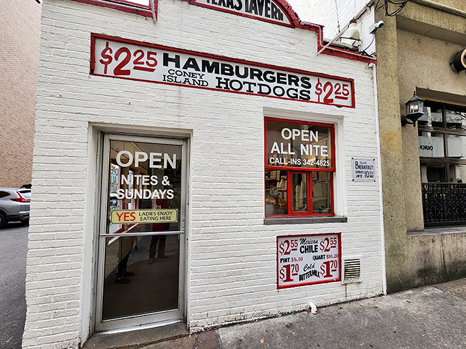 The iconic white brick exterior of Texas Tavern stands like a time capsule in downtown Roanoke, promising affordable eats and endless stories.