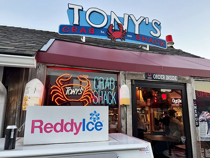 The sunset glow on Tony's Crab Shack feels like nature's way of highlighting where you should be eating dinner tonight.