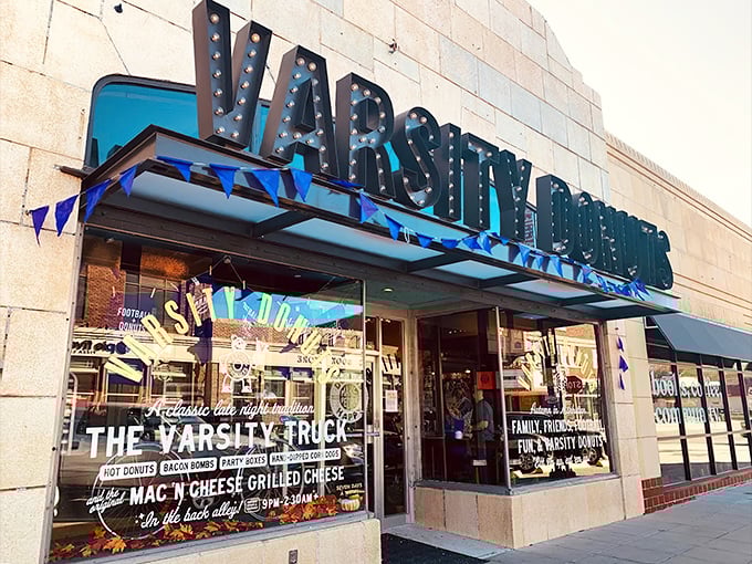 The marquee-style sign at Varsity Donuts lights up Aggieville like a Broadway show where the starring role goes to fried dough and happiness.
