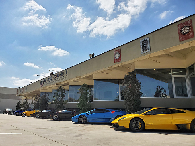 Even the parking lot is a car show at Marconi Automotive Museum, where Ferraris and Porsches casually hang out front like they're waiting for coffee.