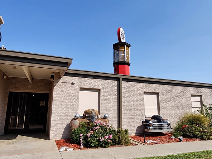 The giant vintage gas pump tower stands like a beacon for car lovers, welcoming visitors to this Route 66 treasure in Sapulpa.