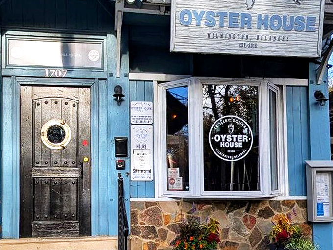 The blue facade of Trolley Square Oyster House beckons like a coastal lighthouse in urban Wilmington. Nautical charm meets historic neighborhood vibes.