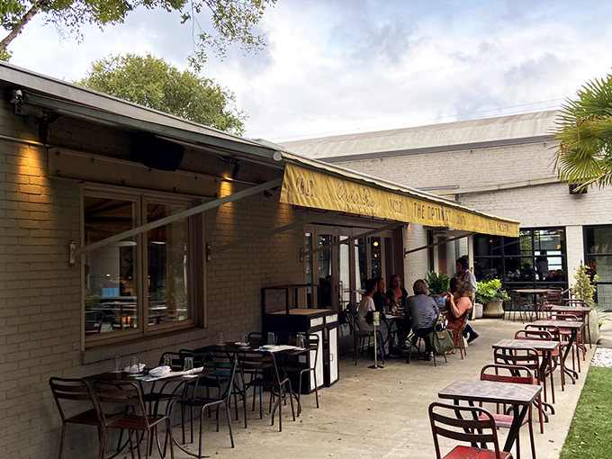 The outdoor oasis at The Optimist proves that sometimes the best appetizer is fresh air and a mini-golf challenge before diving into seafood heaven. 