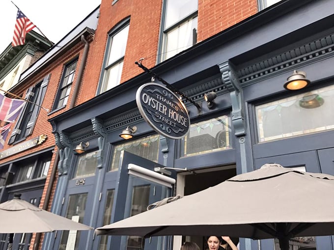The unassuming blue storefront of Thames Street Oyster House stands like a culinary lighthouse in Fells Point, beckoning seafood lovers from miles around. 