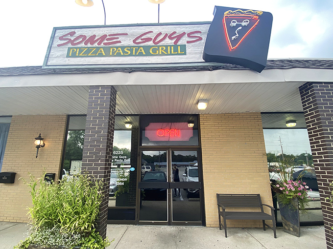 The unassuming storefront that houses pizza greatness. Like finding a diamond in a strip mall, Some Guys Pizza proves extraordinary food often hides in ordinary places.