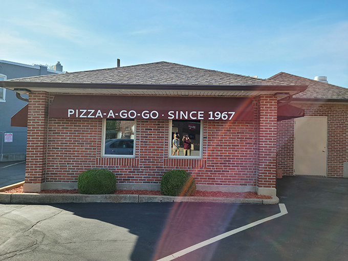 The unassuming brick exterior of Pizza-A-Go-Go has been welcoming hungry St. Louisans since 1967, proving great pizza doesn't need flashy signage.
