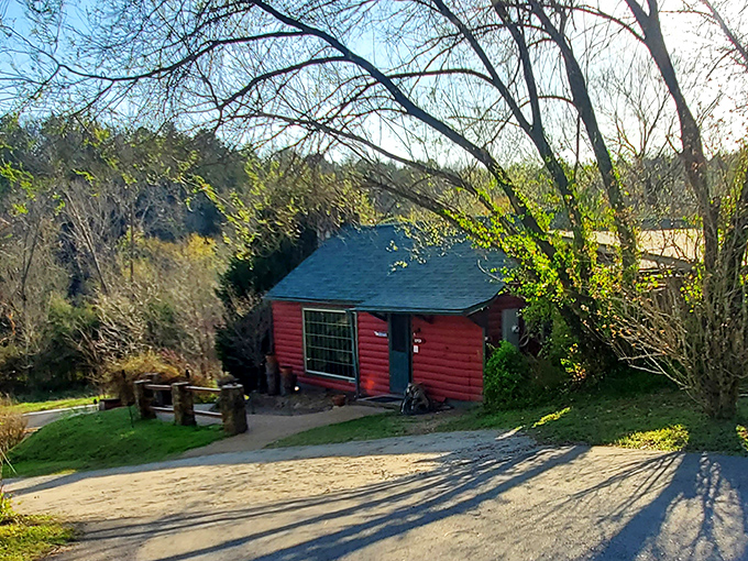 The rustic red cabin exterior isn't trying to impress anyone&mdash;until you taste what's inside. Ozark charm at its most delicious.