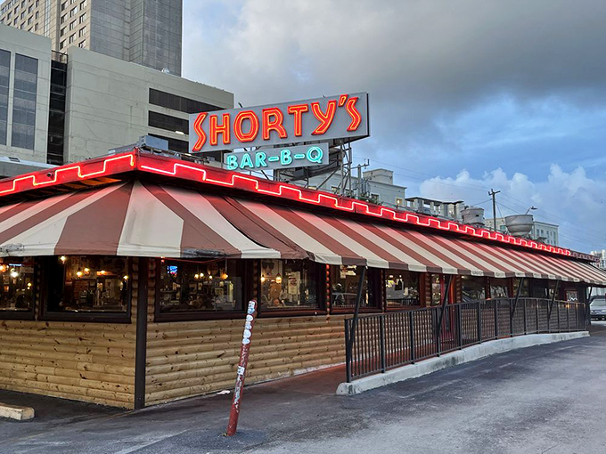 The iconic red and white striped awning of Shorty's has been Miami's smoke signal to barbecue lovers since 1951. A landmark that's survived hurricanes, fires, and food trends.