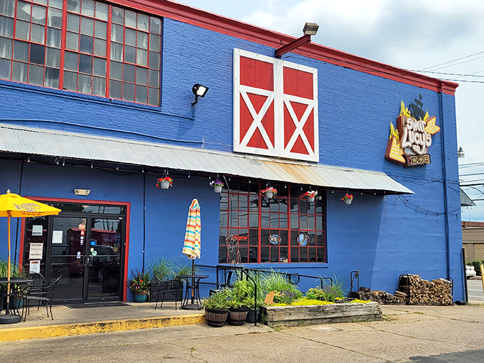The bright blue exterior of Sweet Lucy's stands out like a barbecue beacon in Northeast Philly, promising smoky treasures within those barn-like walls.