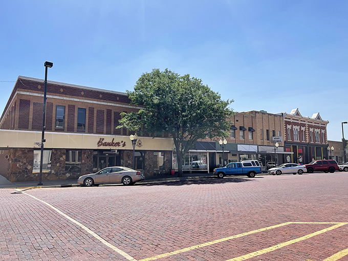 Downtown Russell's brick streets and historic facades transport you to simpler times, while that impossibly blue Kansas sky promises adventure around every corner.