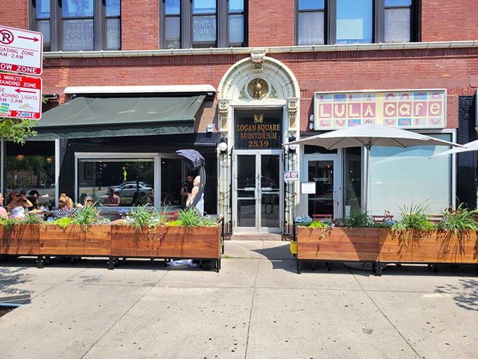 Logan Square's architectural gem houses culinary magic. That ornate entrance and colorful sign promise something special before you even taste a bite.