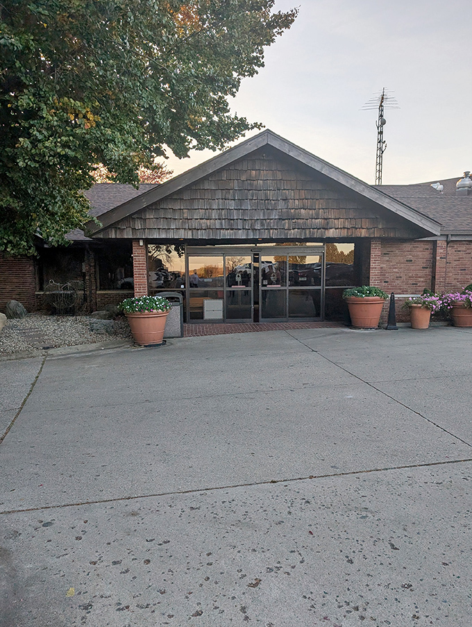 The unassuming cedar-shingled entrance to The Beef House belies the carnivorous paradise waiting inside. Like finding a treasure chest disguised as a garden shed.